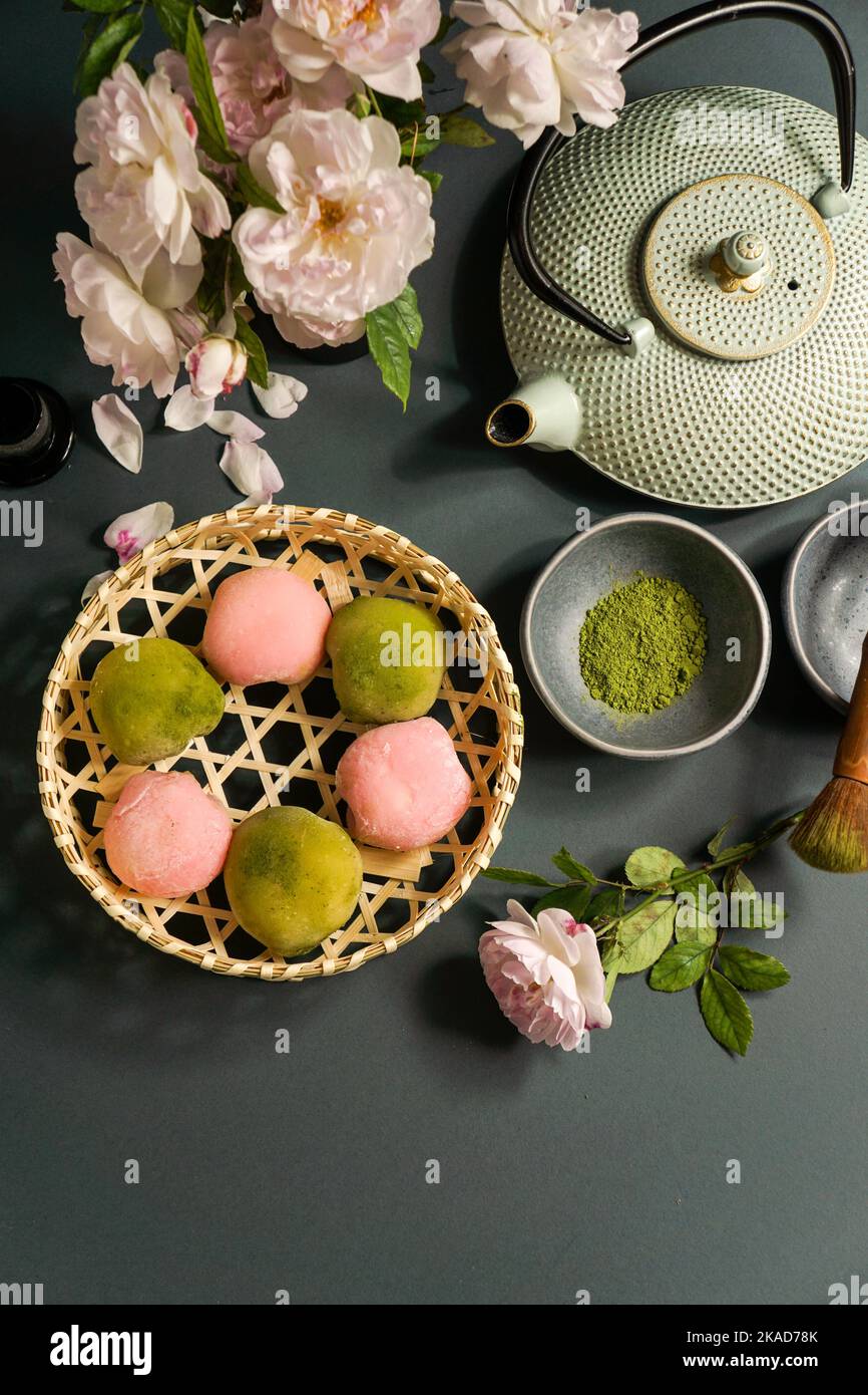 Japanese dessert mochi with matcha green tea powder and cherry ...