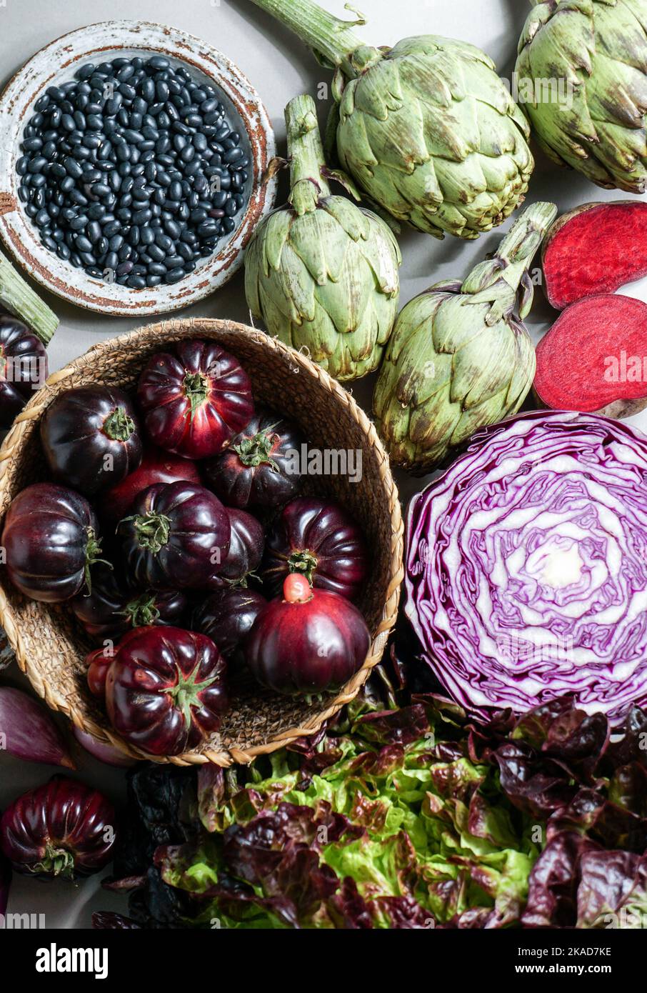 purple and red, violet vegetables on the purple background, top view ...