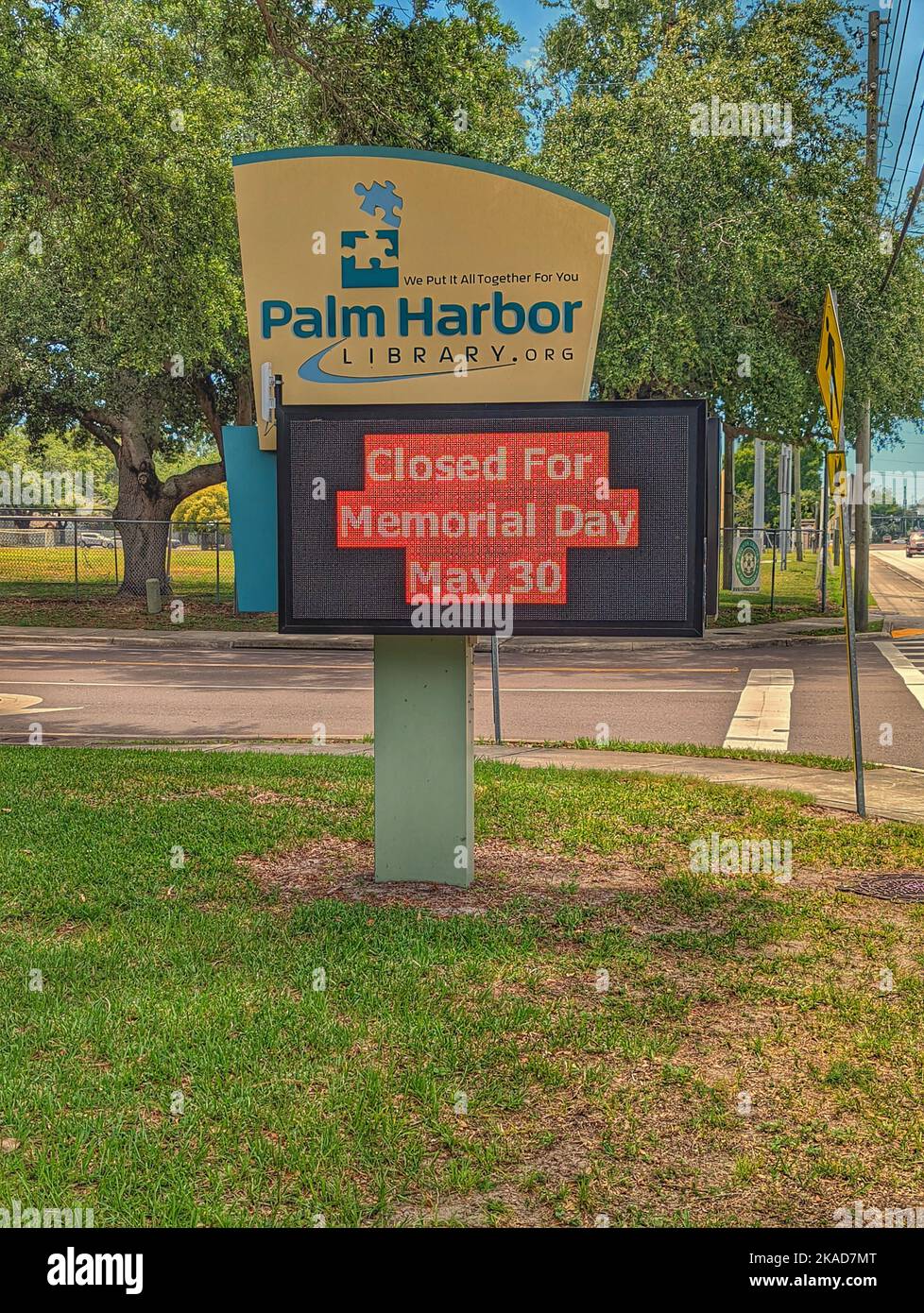 A Palm Harbor Florida public library sign Stock Photo - Alamy
