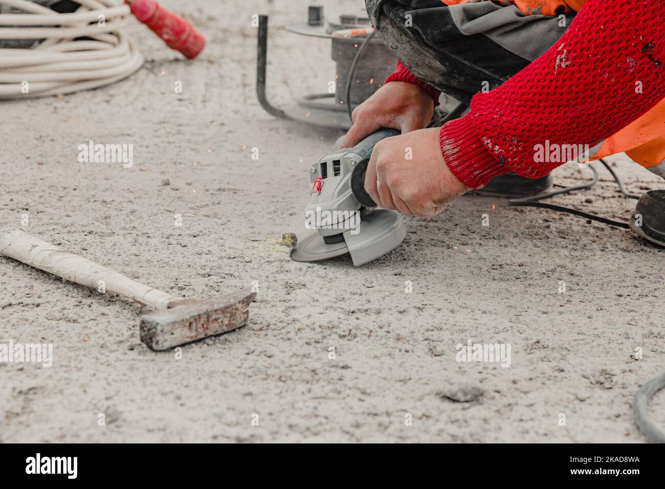 A closeup shot of a hands doing installation work during construction ...