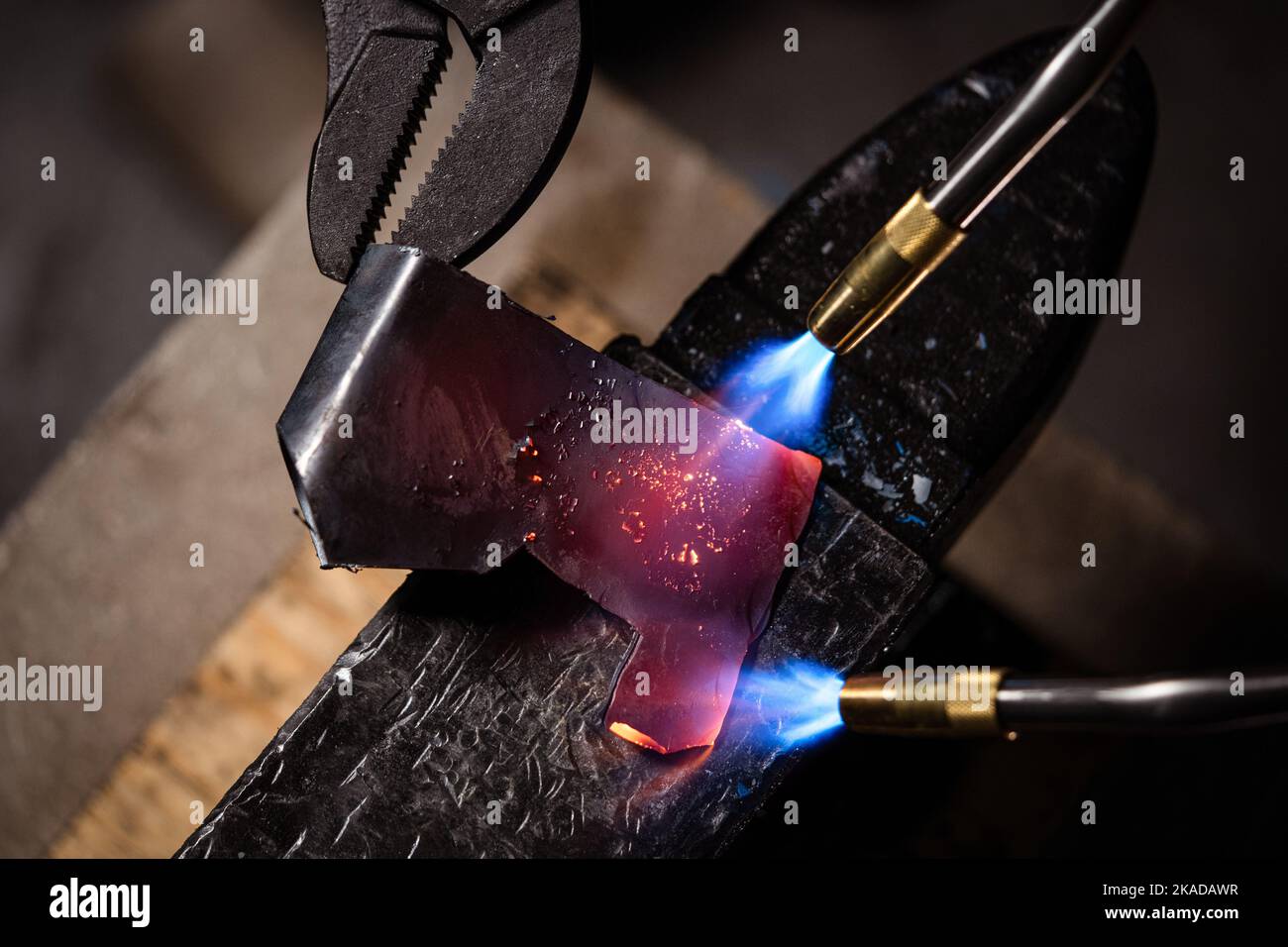 A top view of a piece of metal being melted in the workshop Stock Photo ...