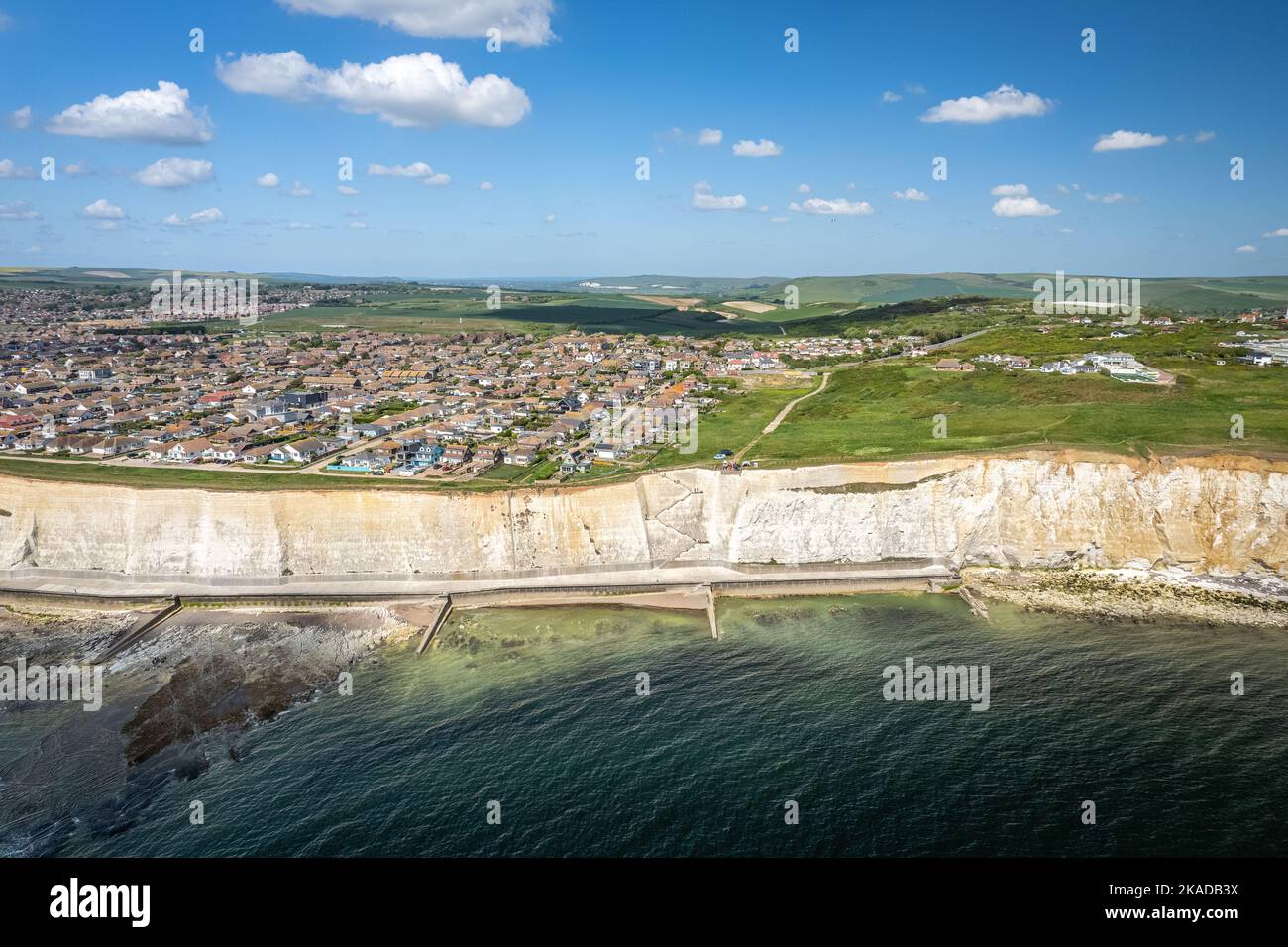An aerial view of the Roedean School, cliffs, and the beach in Brighton ...