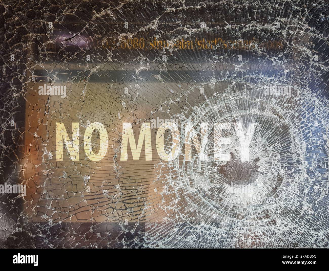 No money concept. ATM with broken glass Stock Photo - Alamy