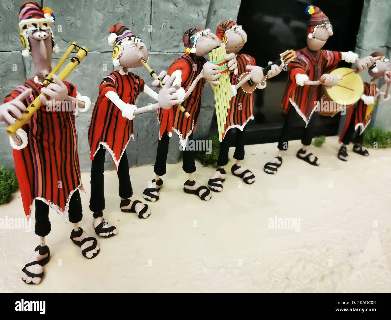 a doll playing musical instrument Stock Photo - Alamy