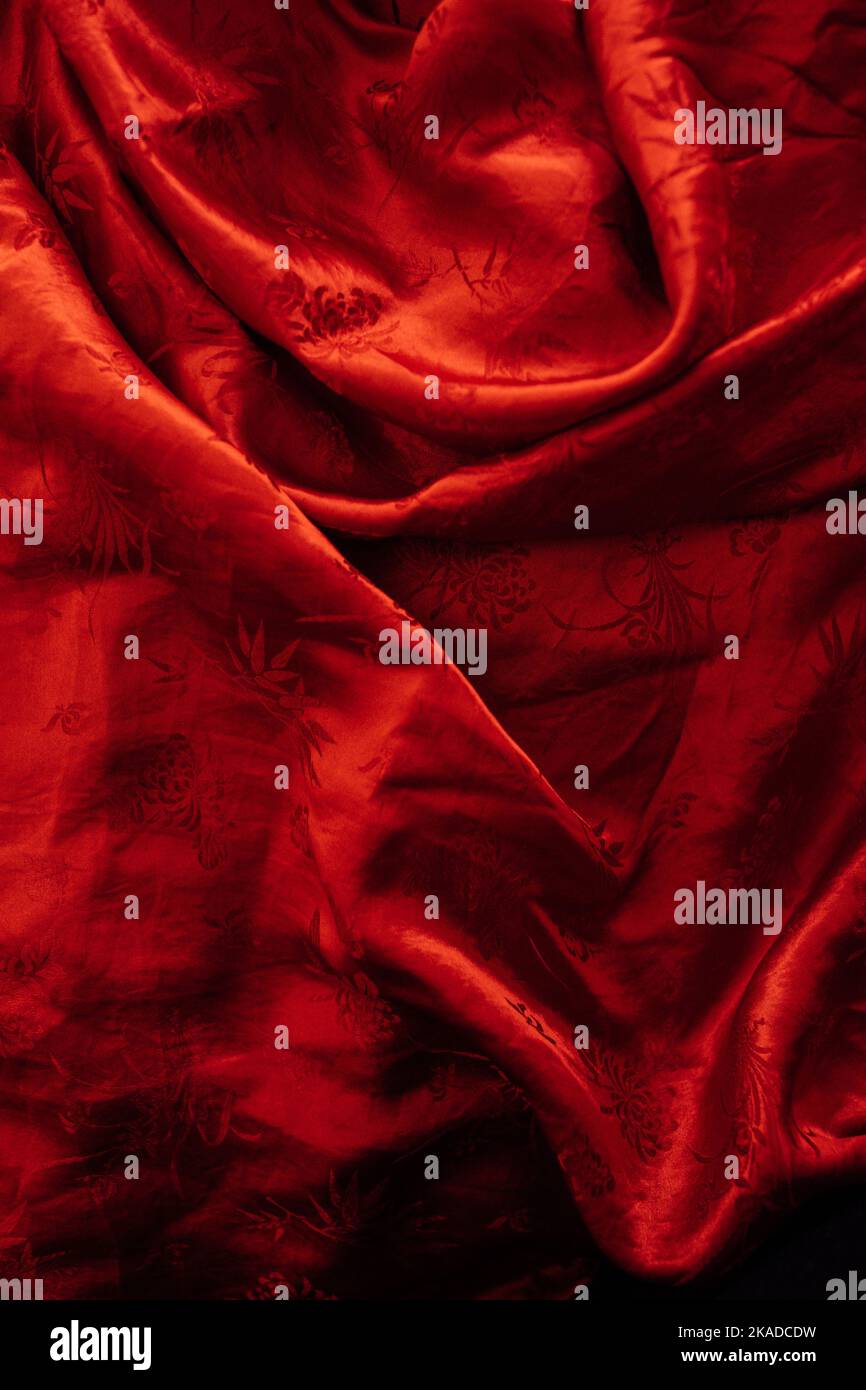 bright, vibrant red silk shiny cloth Chinese made robe Stock Photo - Alamy