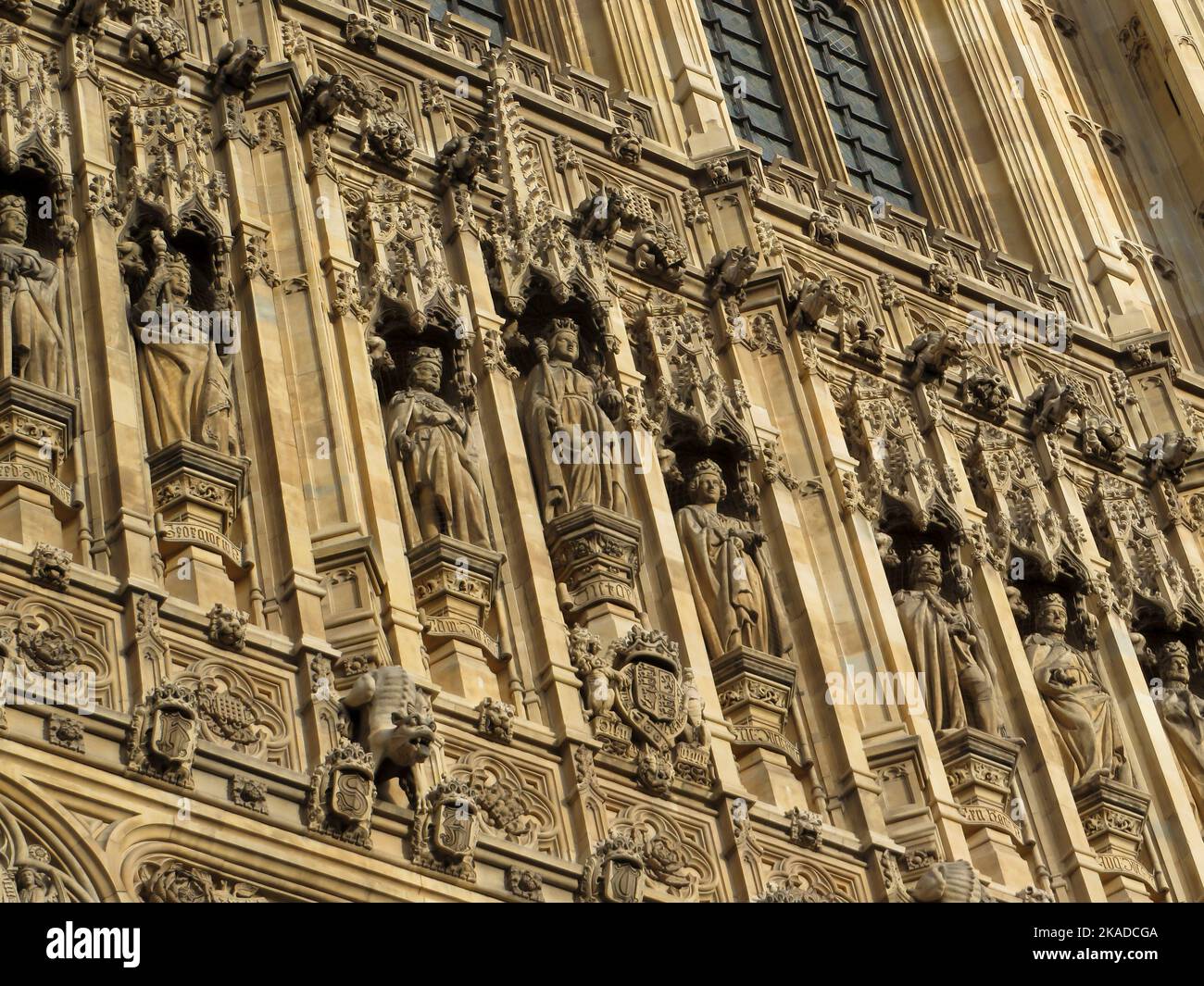 A facade of an old church with statues on the wall Stock Photo - Alamy