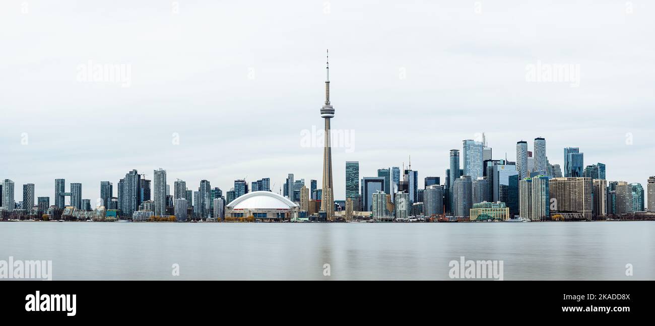 A panoramic view of the skyline of Toronto with tall skyscrapers and ...