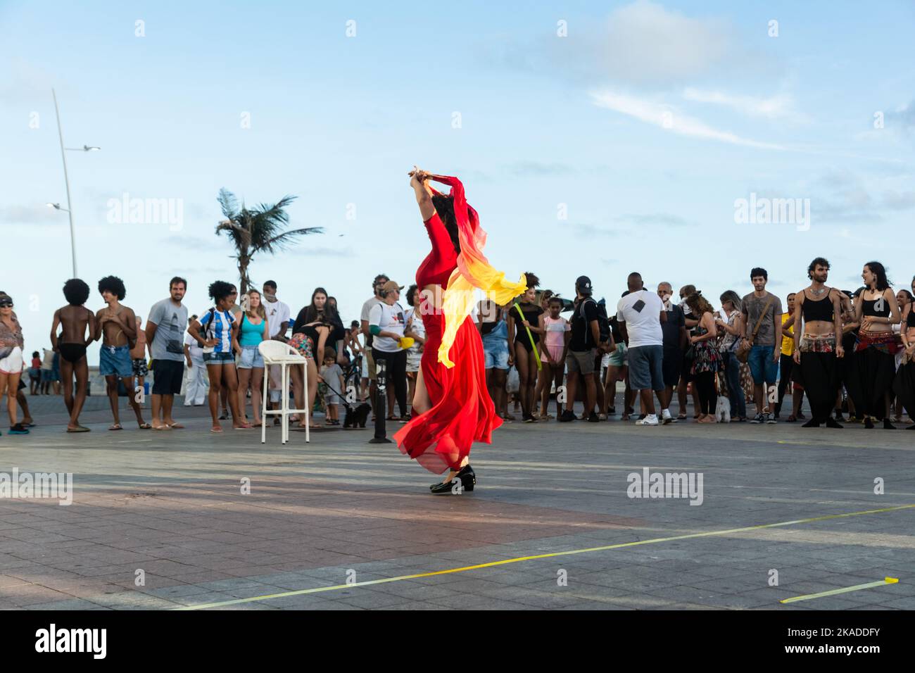 A dancer performing street belly dancing at Farol da Barra square in ...