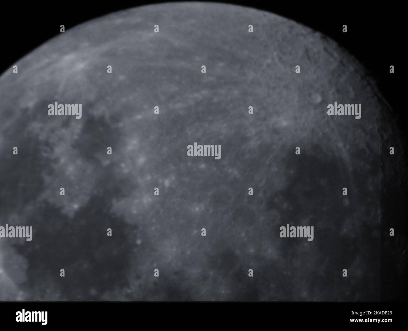 A top view of the surface of the Moon from a telescope on a black ...
