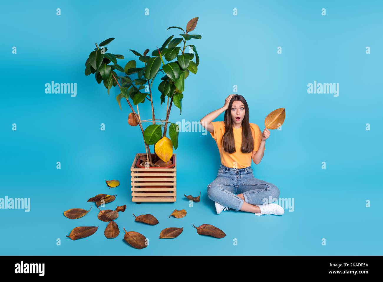 Photo of upset impressed young lady wear yellow t-shirt arm head ...