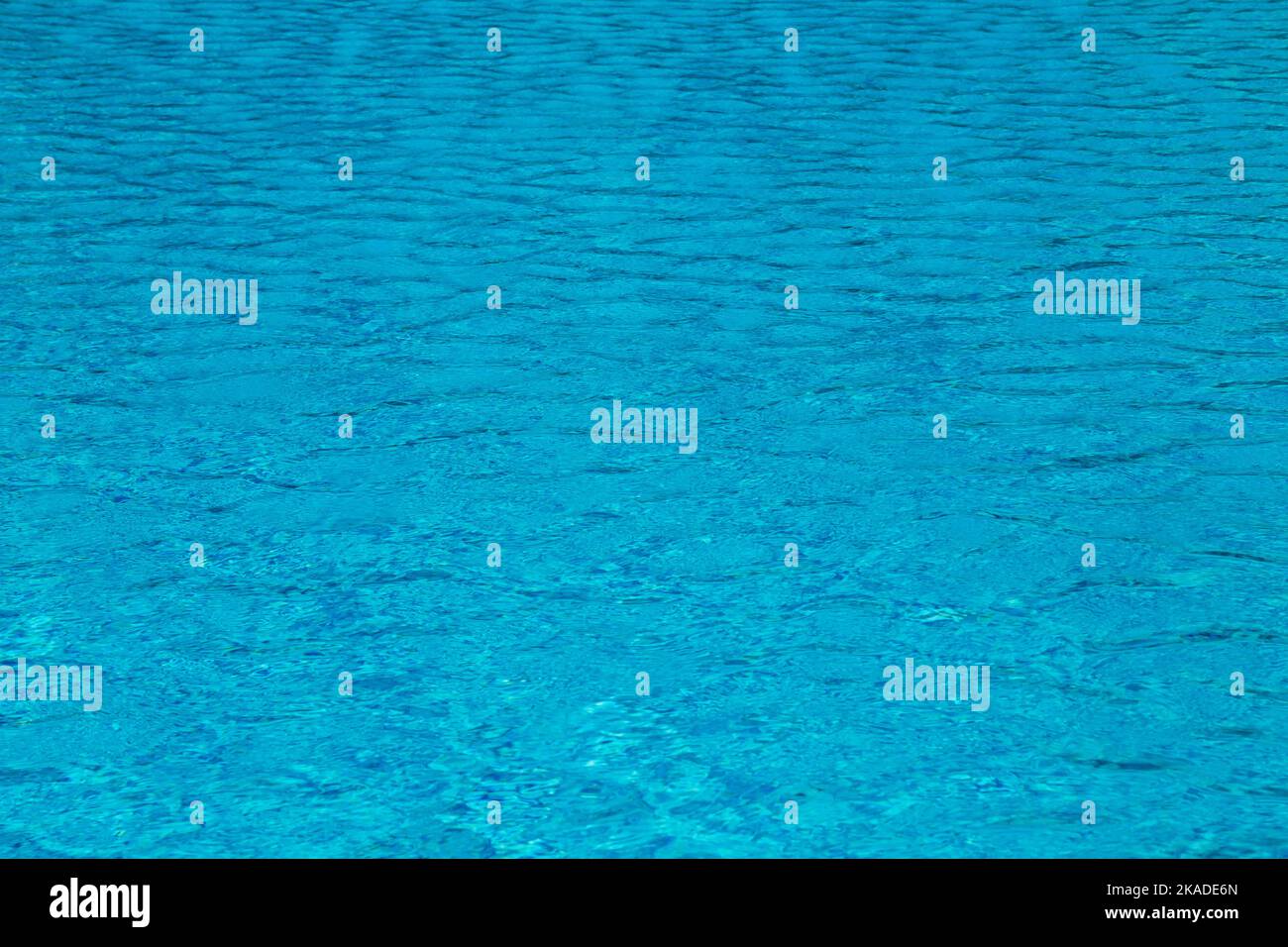 Blue water with ripples and sunny reflections in swimming pool Stock ...
