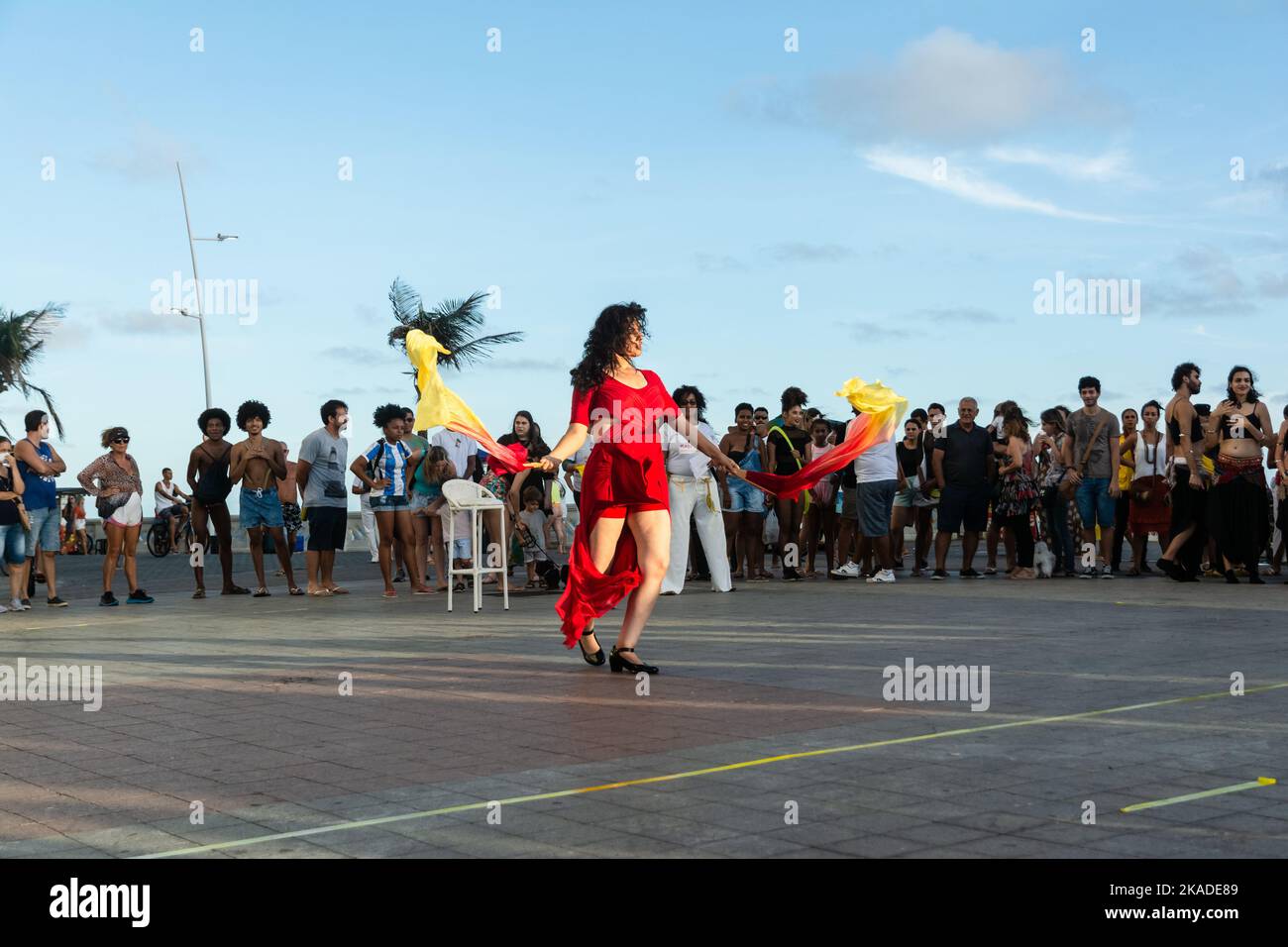 A dancer performing street belly dancing at Farol da Barra square in ...