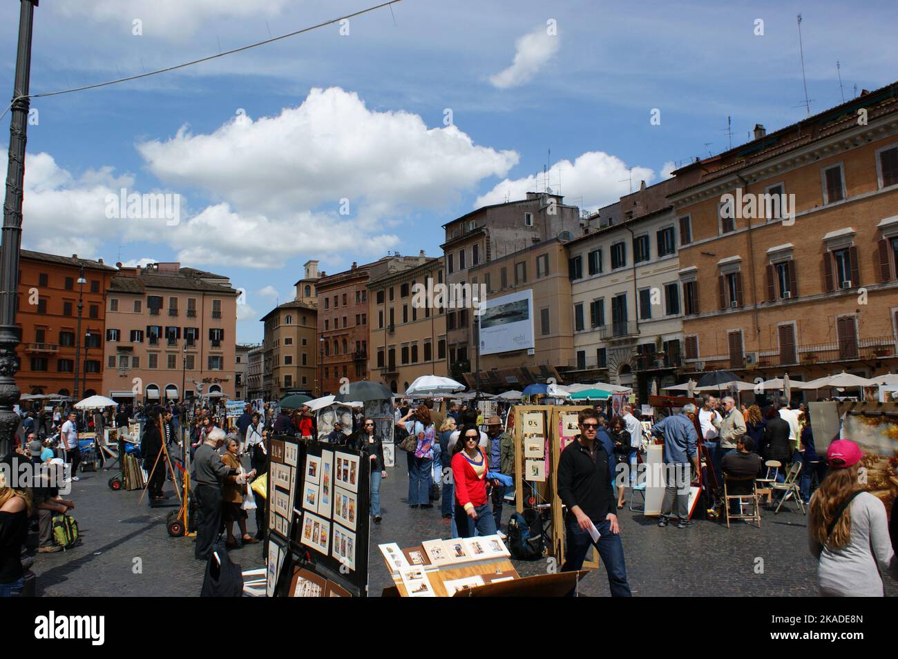 A group people on the streets of Rome, Italy under a cloudy sky Stock ...