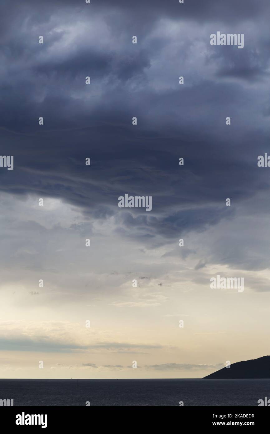 Dark dramatic sky with stormy clouds over sea Stock Photo - Alamy