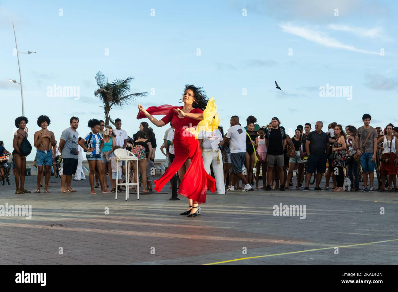 A dancer performing street belly dancing at Farol da Barra square in ...