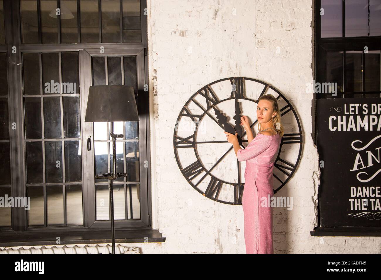 Luxury young woman on the big dial. Girl and clock in Christmas Stock ...