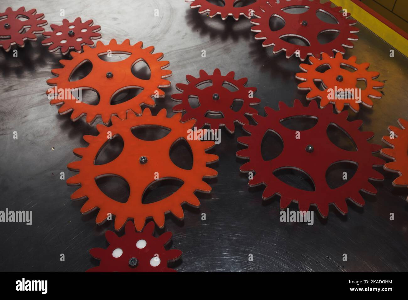 gears of different sizes side view Stock Photo - Alamy