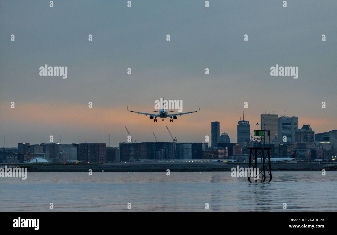 Jet airplane landing in boston hi-res stock photography and images - Alamy