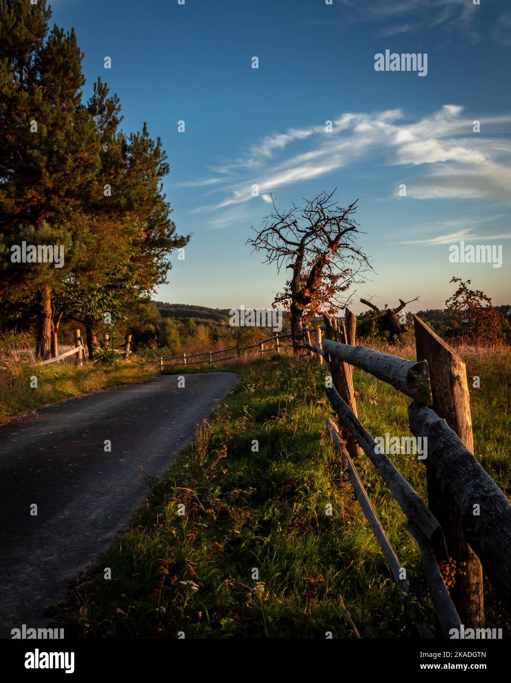 Autumnal sunset landscape in Sleza Massif, Poland. Old wooden fence ...