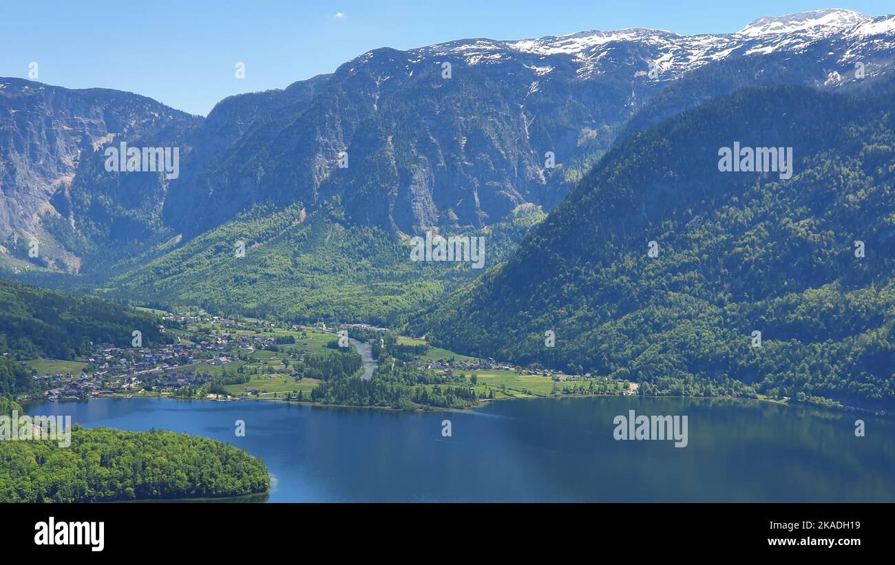 The Hallstatt village on Lake Hallstatt's shore in Austria's ...