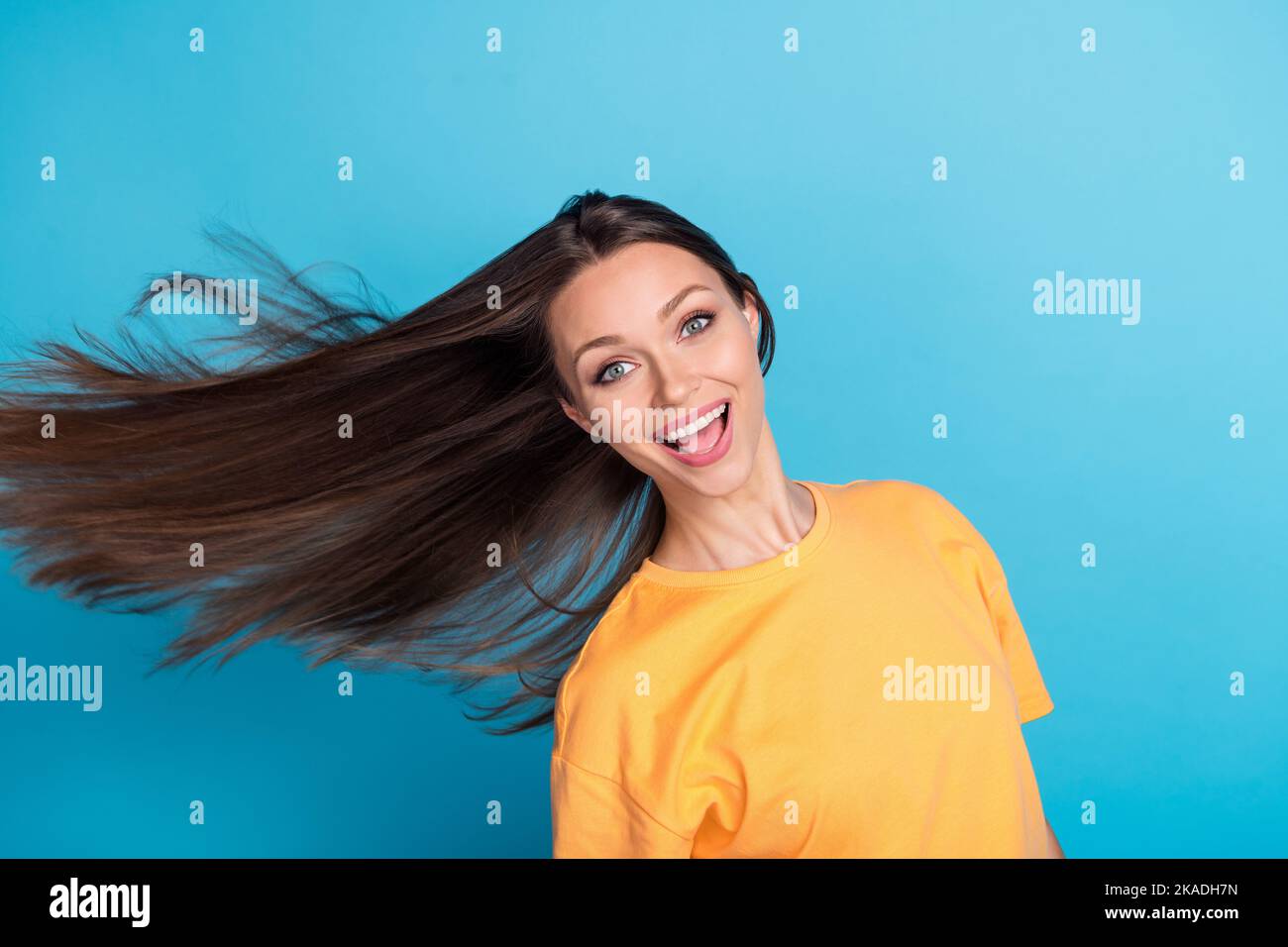 Photo of shiny excited lady wear yellow t-shirt hair fluttering air ...