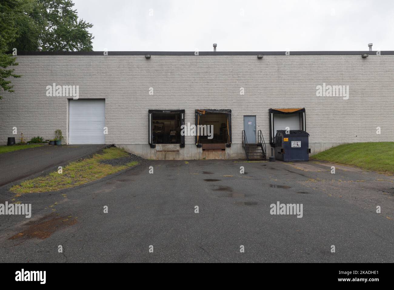 A view of an exterior of a commercial building for manufacturing or ...