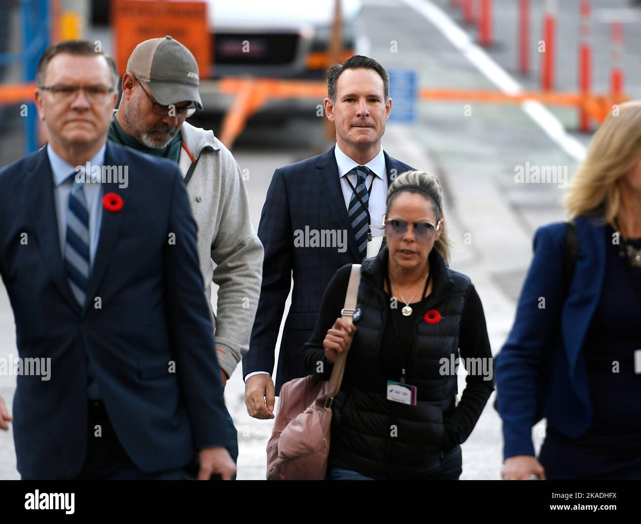 Freedom Convoy organizers Tom Marazzo, centre rear, lawyer Keith Wilson ...