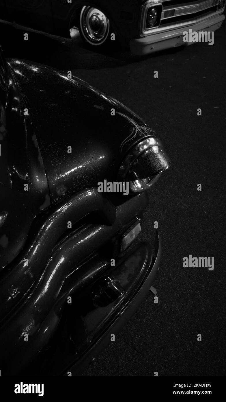 A vertical grayscale shot of a vintage car exterior Stock Photo - Alamy