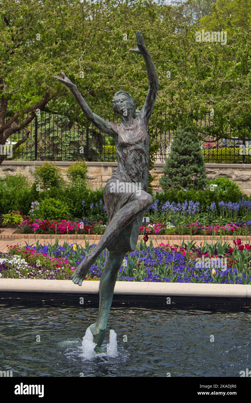 A vertical shot of a dancing lady sculpture in a Muriel Kauffman ...