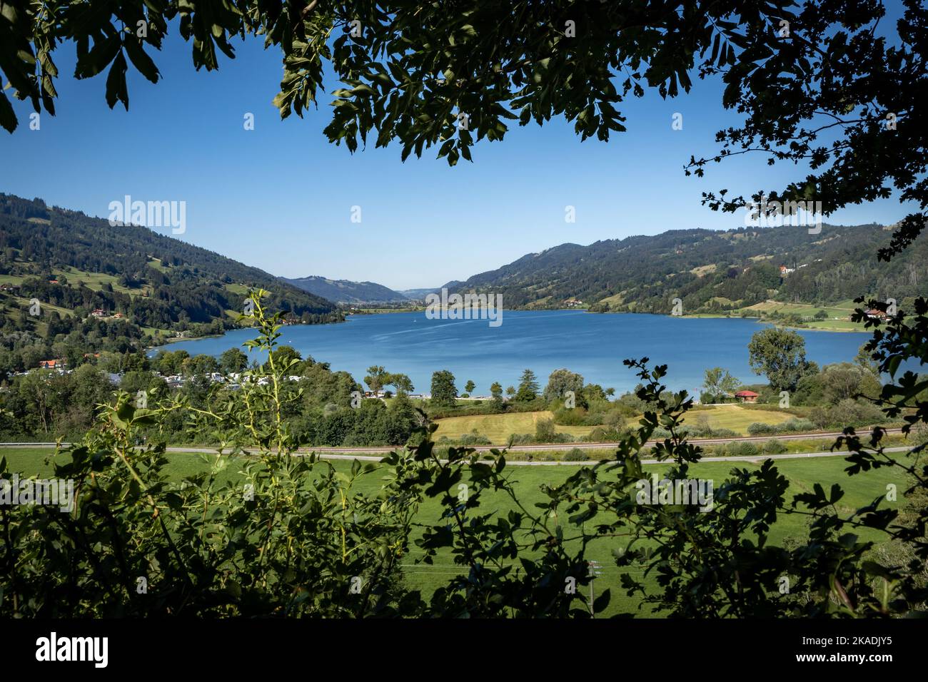 Mountains and Grosser Alpsee lake panorama in Bavarian Alpes near ...