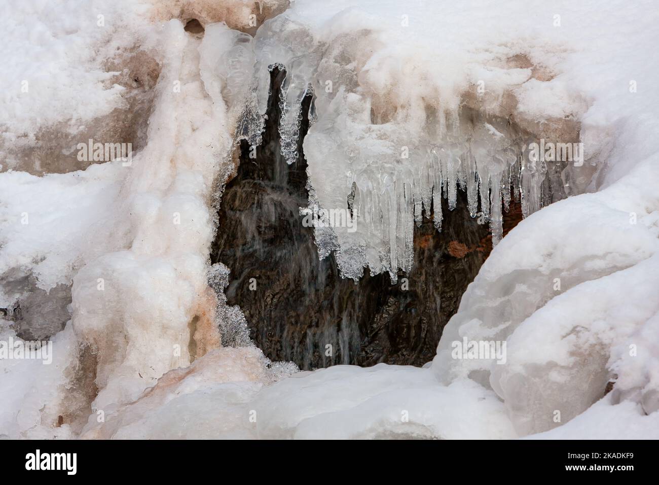 Close-up detail of the cascades of Faux Falls with ice and snow in ...