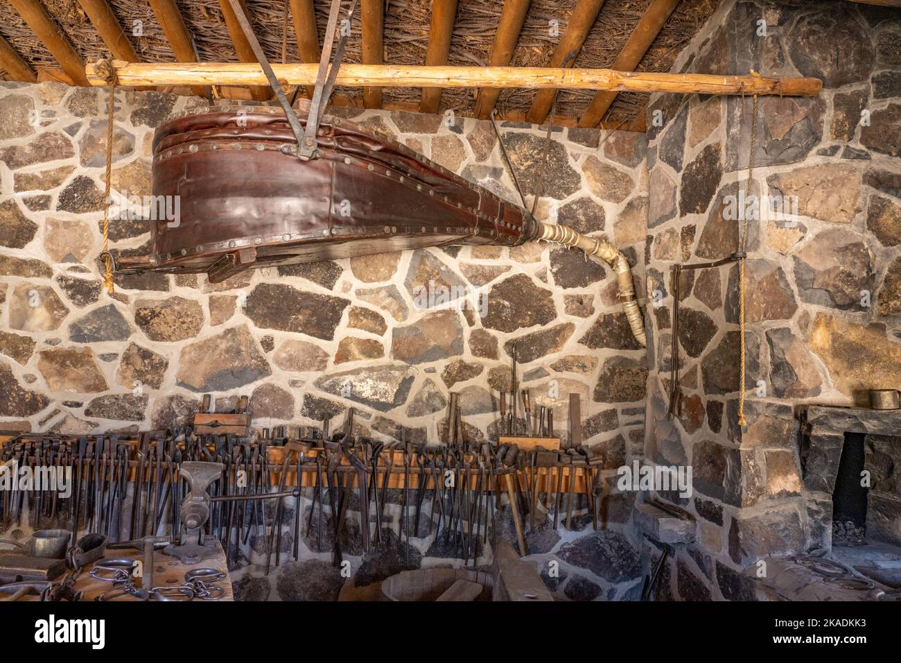 A leather bellows & tools in the blacksmith shop at the pioneer Cove ...