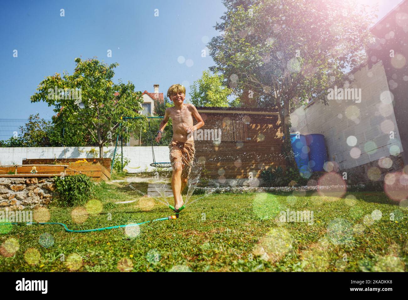 Water sprinkler running in hi-res stock photography and images - Alamy