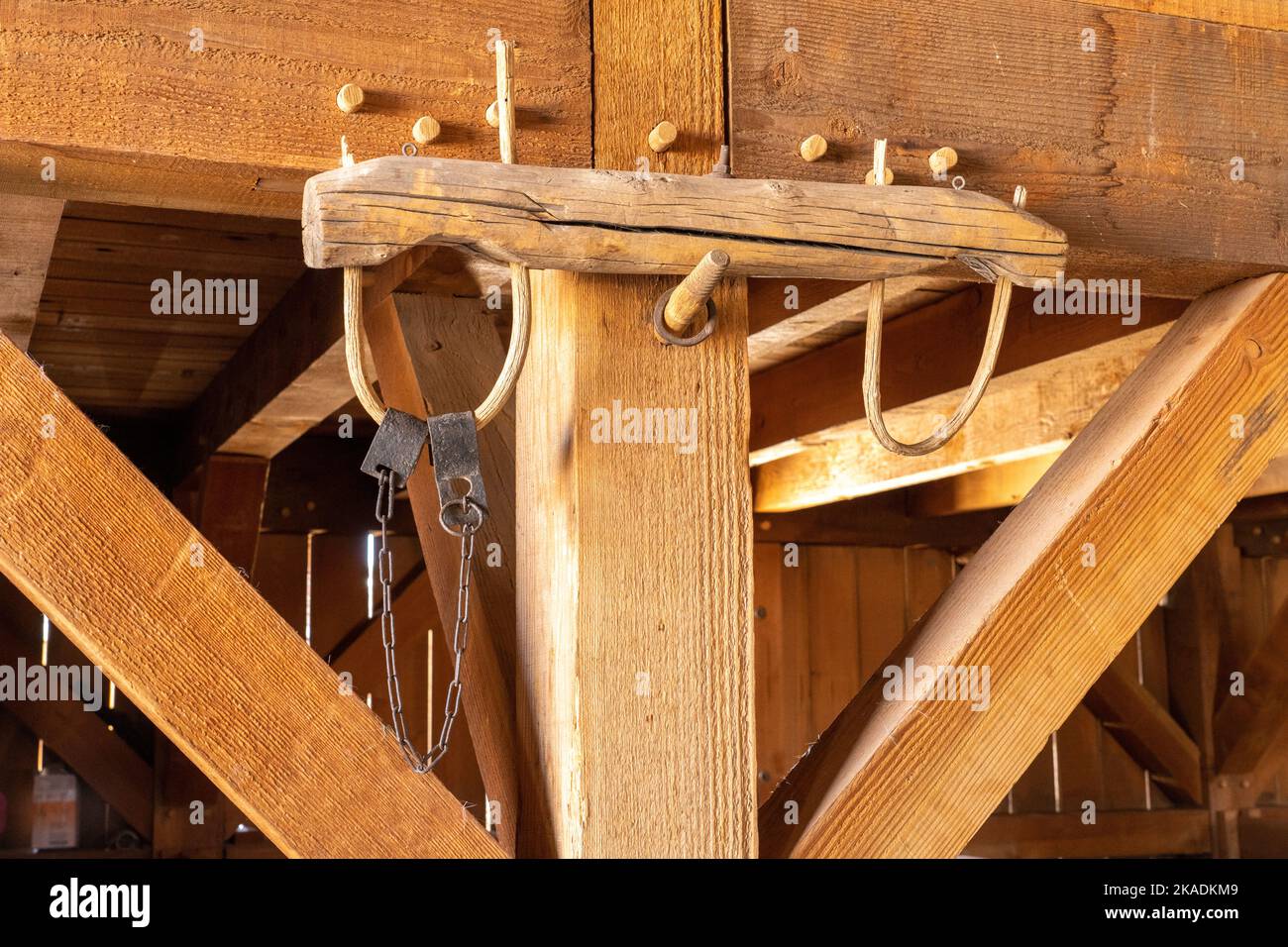 An antique wooden oxen yoke in the barn of the pioneer Cove Creek Ranch ...