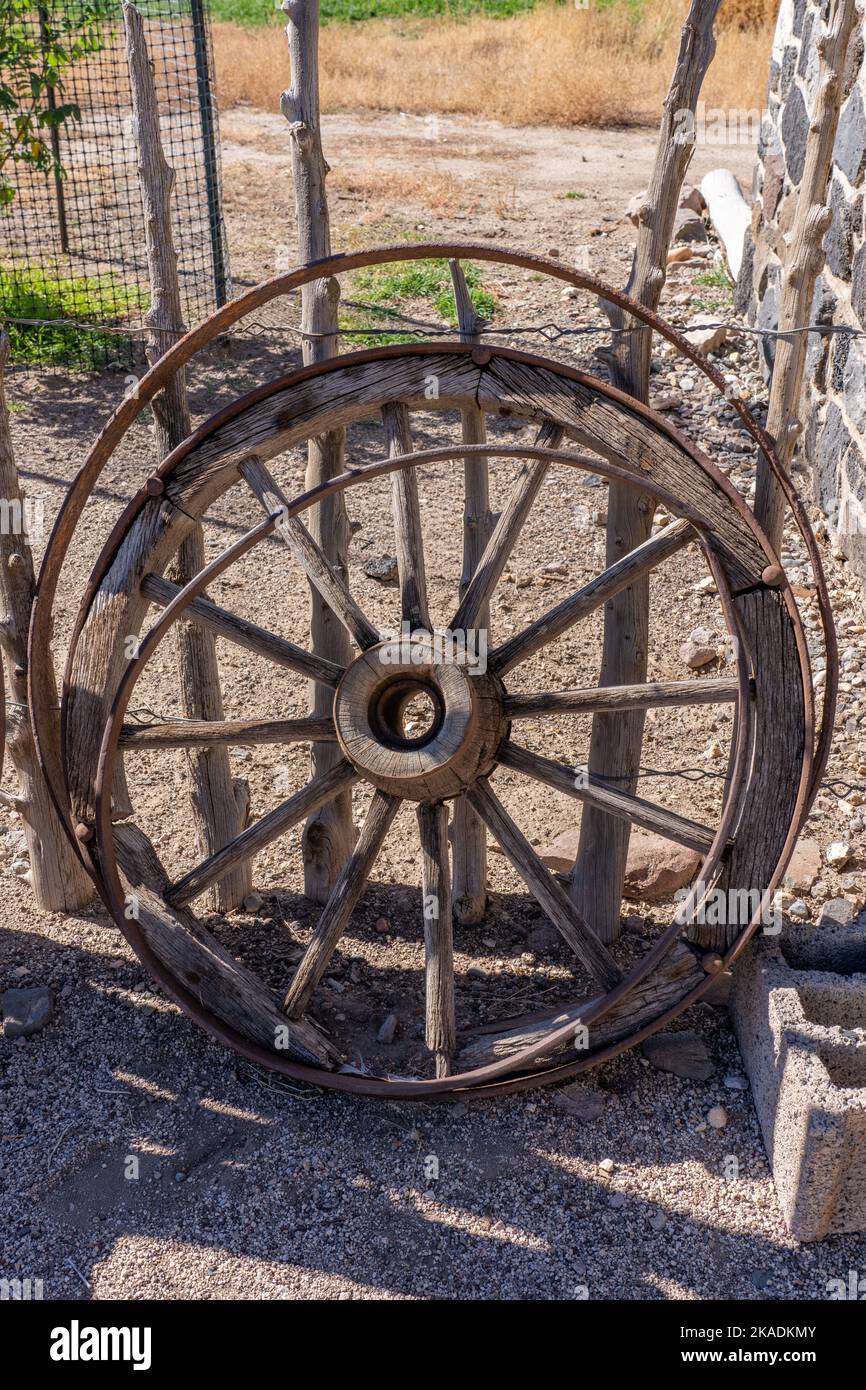 An old wooden wagon wheel & metal tires by the blacksmith shop at the ...