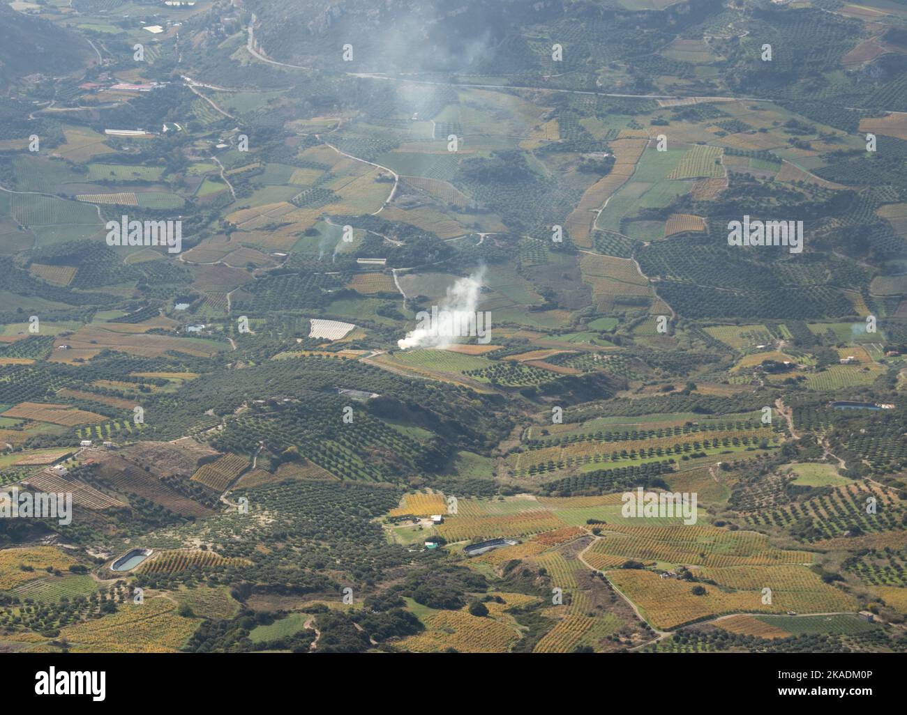 Rural landscape, olive groves and country roads of Crete. View from ...