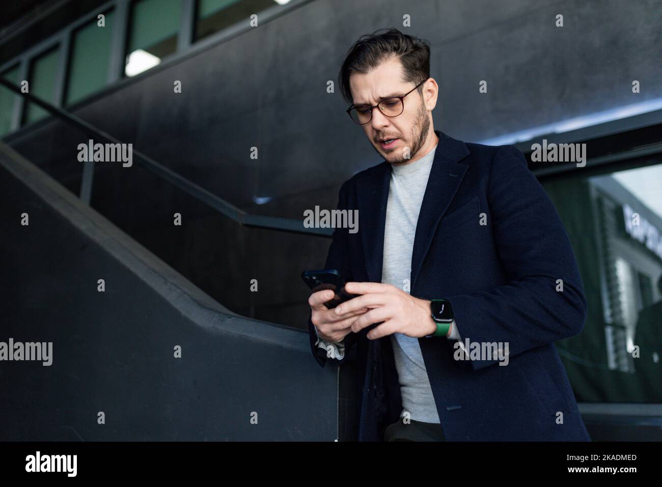 successful businessman working remotely from mobile phone outside Stock ...