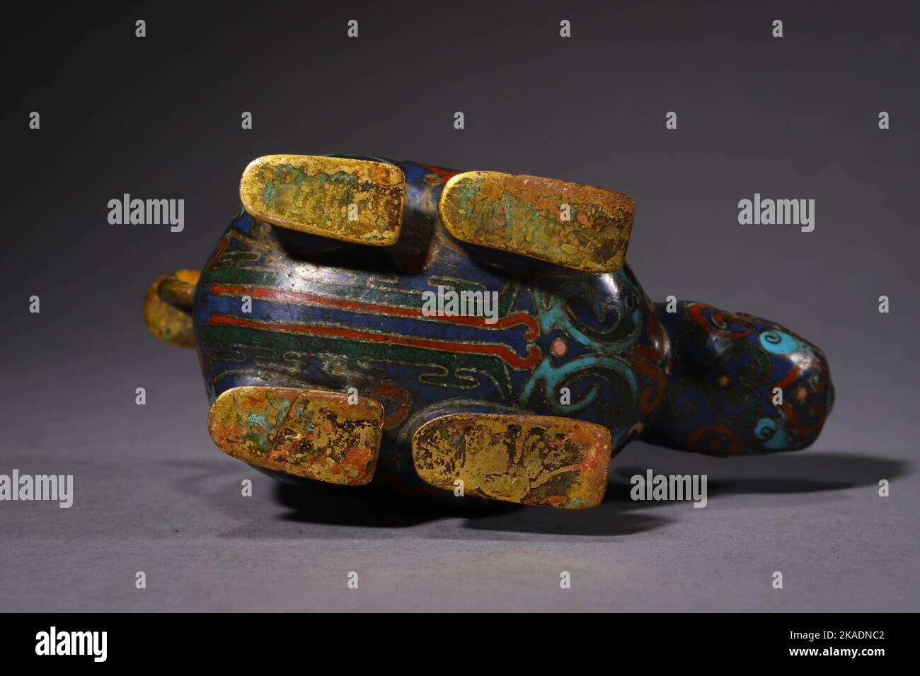 A closeup of an antique Chinese style Cloisonne gilt bronze mythical ...