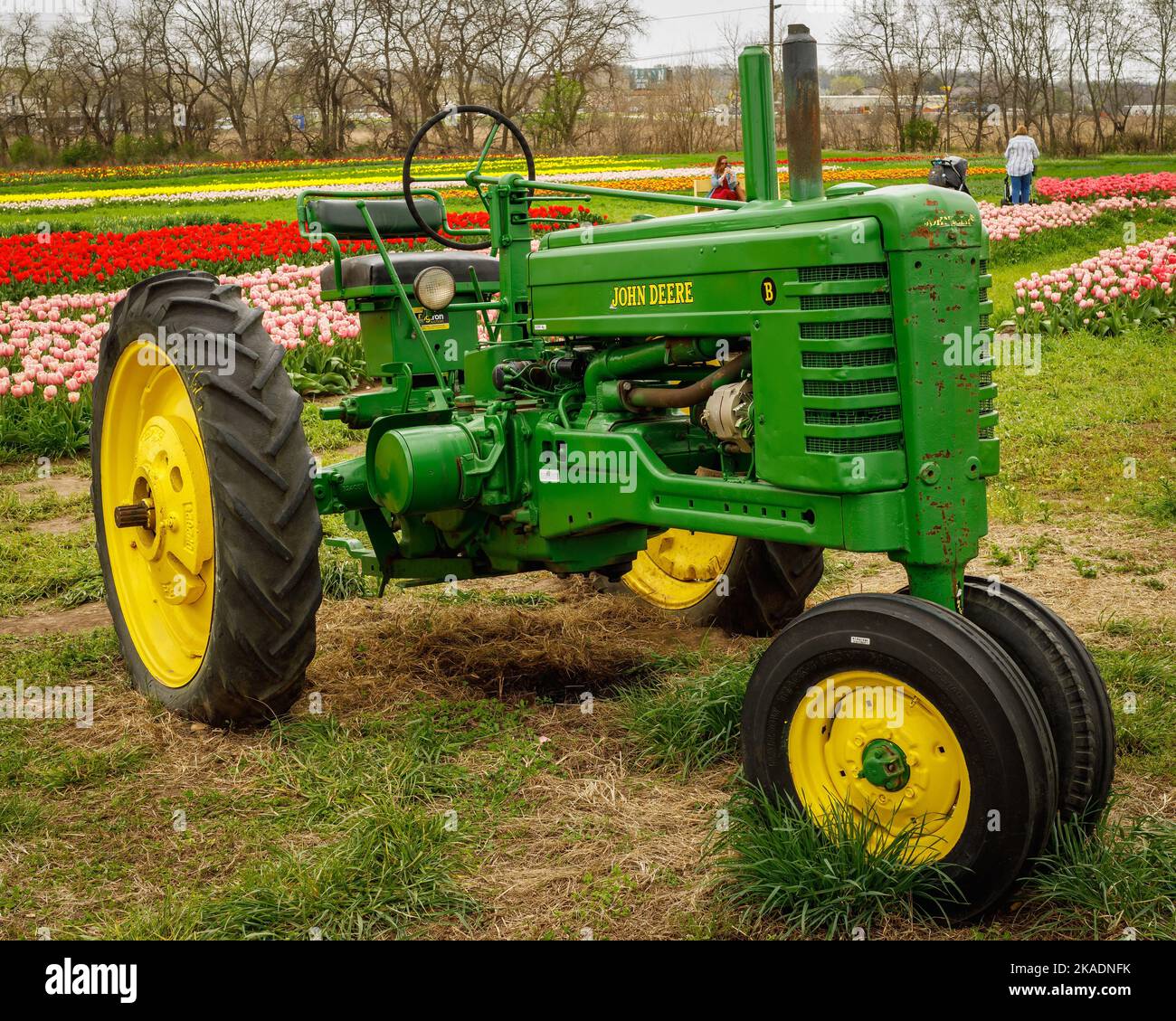 A closeup of an old john deere tractor on a display at a farm Stock ...