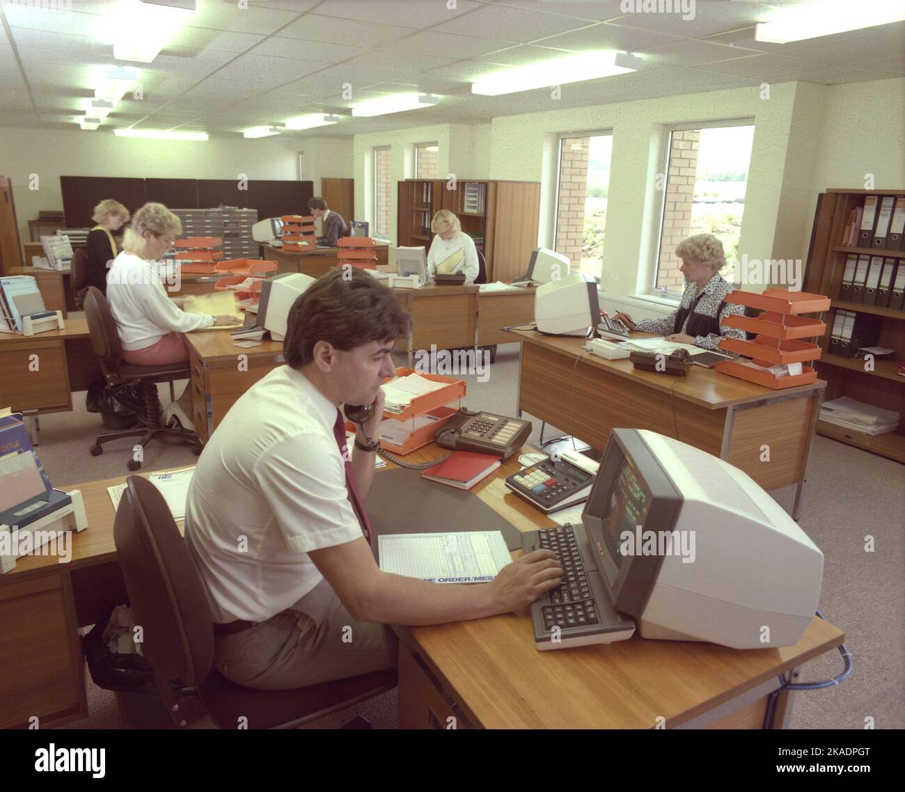 1990, historical, open-plan office, male & female employees working at ...