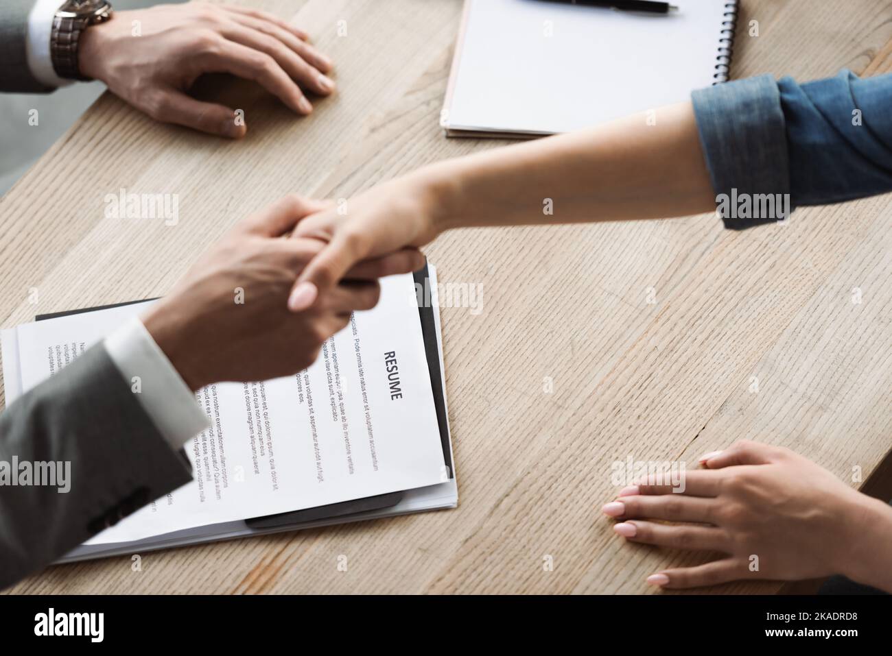 Job interview man woman young handshake hi-res stock photography and ...