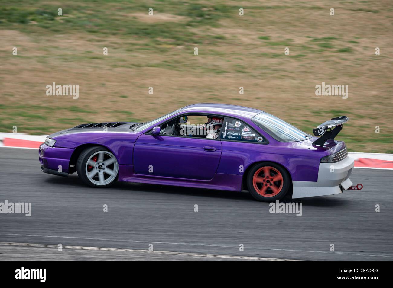 Nissan Silvia S14 drifting on the race track Stock Photo - Alamy
