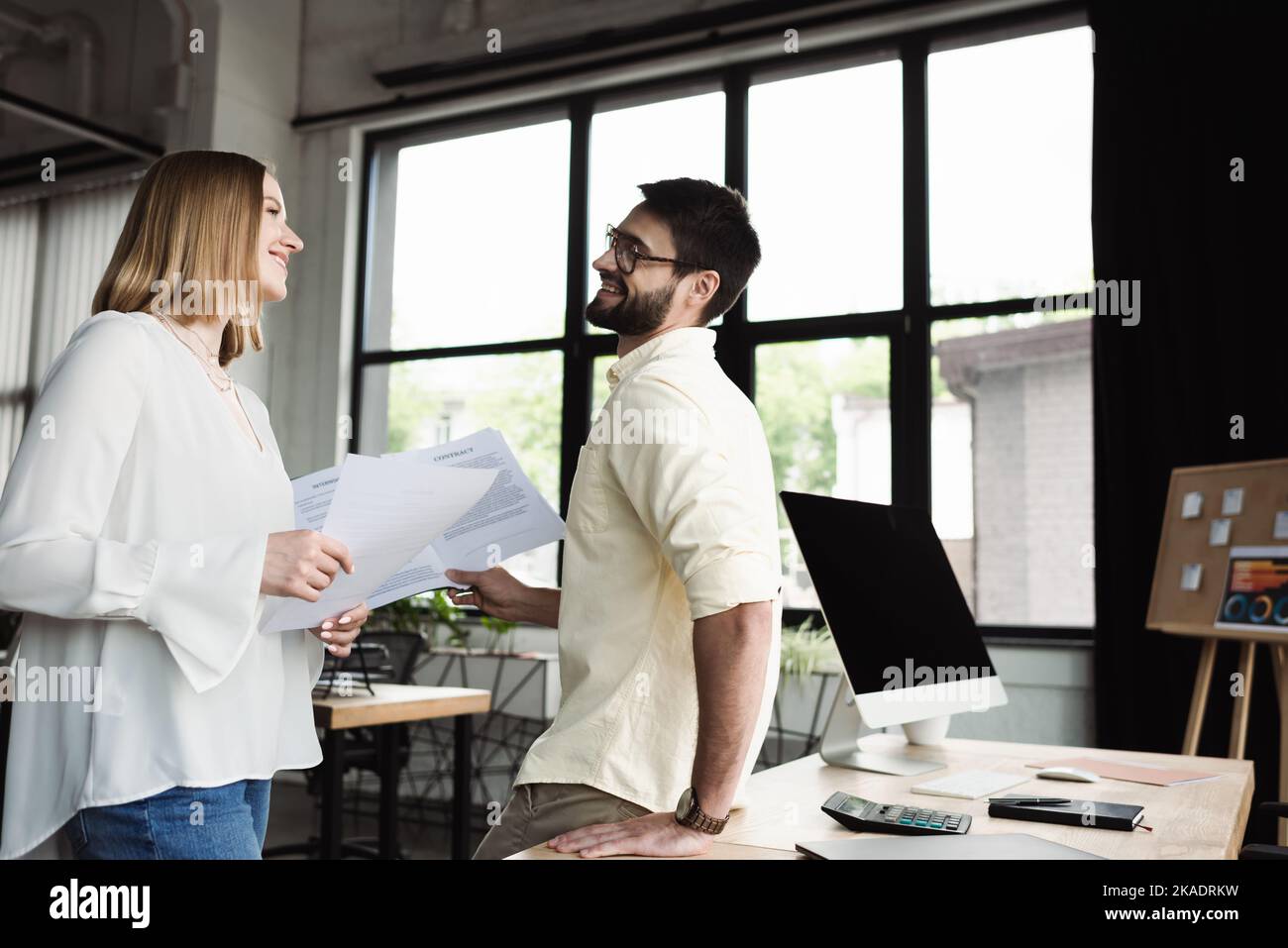 Side view young employee in hi-res stock photography and images - Alamy