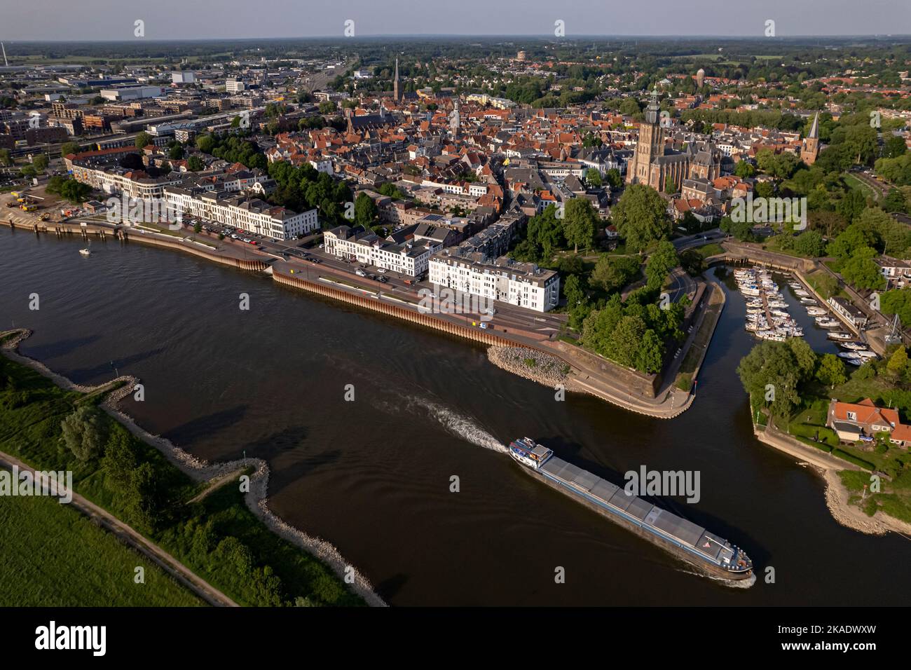 Medieval city seen from above with inland shipping large cargo vessel ... Medieval city seen from above with inland shipping large cargo vessel ...