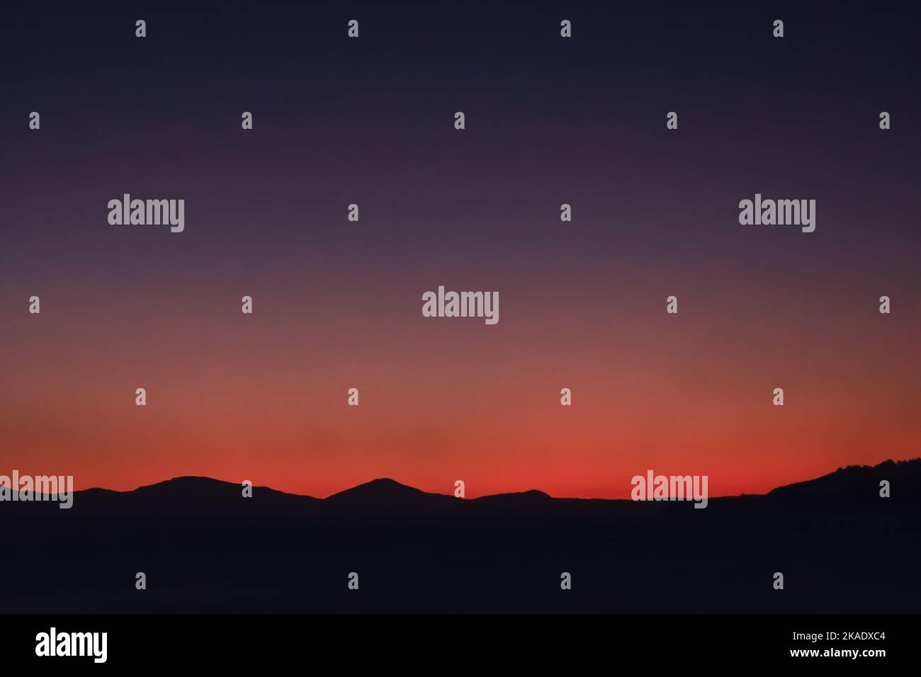 A beautiful view of the horizon with a shade of the sunset in the night ...