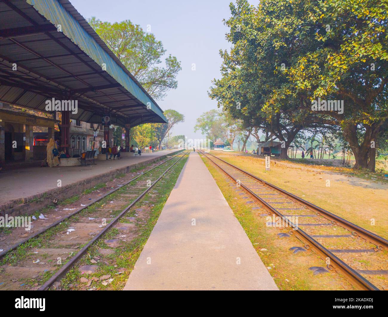 The platform of the rural railway station, passengers are waiting for ...