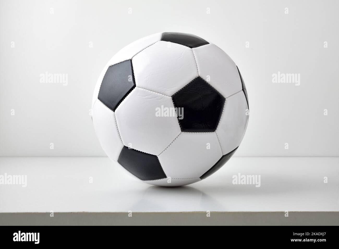 Detail view of classic black and white leather soccer ball isolated on ...