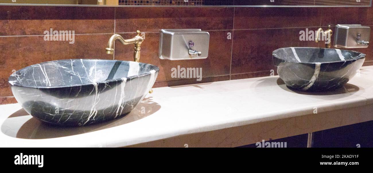 Black beautiful Marble sink with cast iron faucet in the bathroom Stock ...