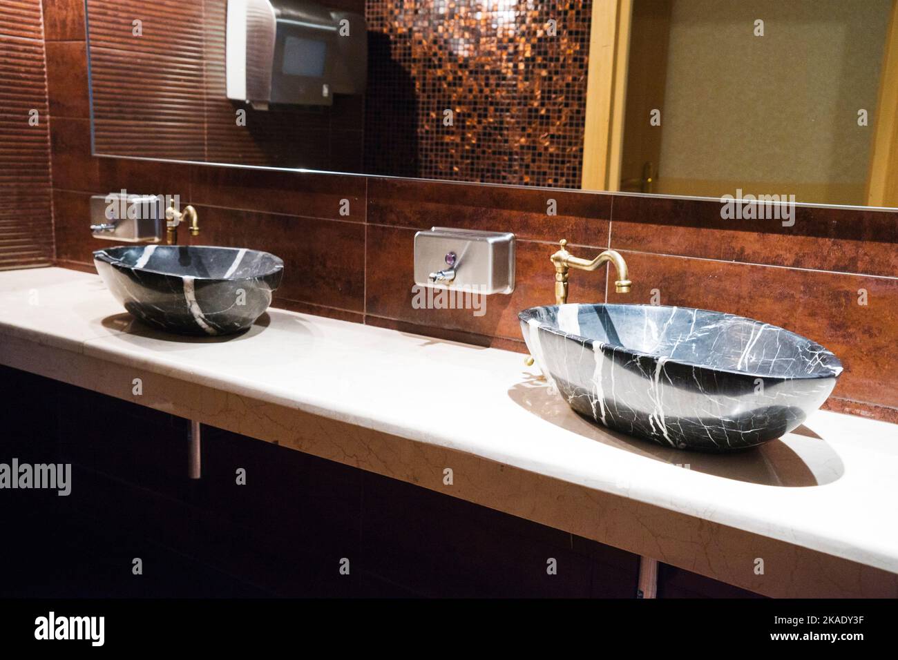 Black beautiful Marble sink with cast iron faucet in the bathroom Stock ...