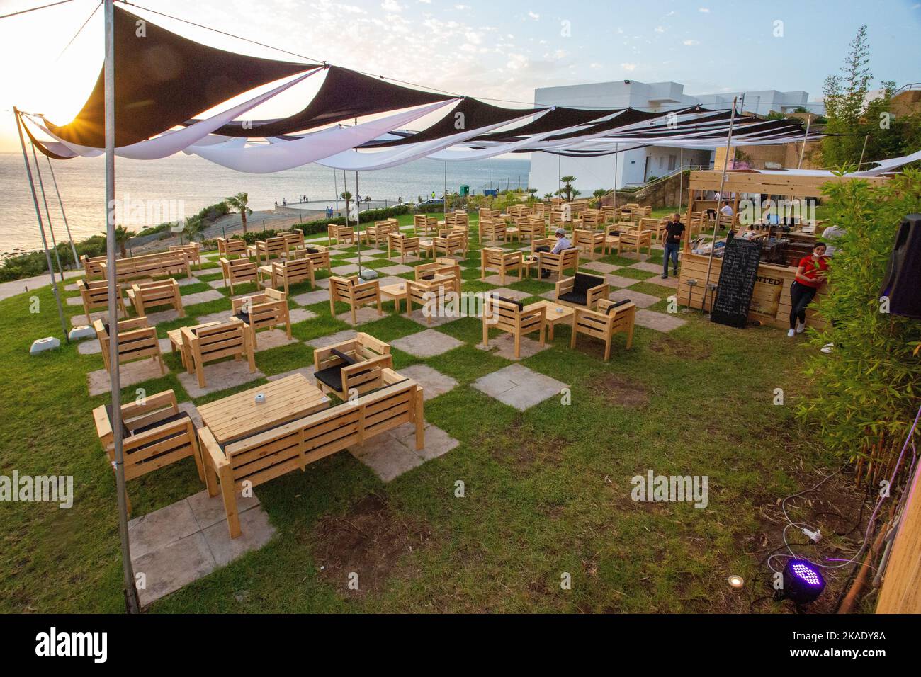 hotel patio terrace with wooden furniture Stock Photo - Alamy
